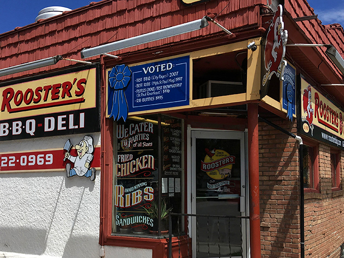 The iconic red exterior of Rooster's BBQ Deli stands like a beacon to hungry Minnesotans, complete with its blue ribbon of approval and cartoon mascot.