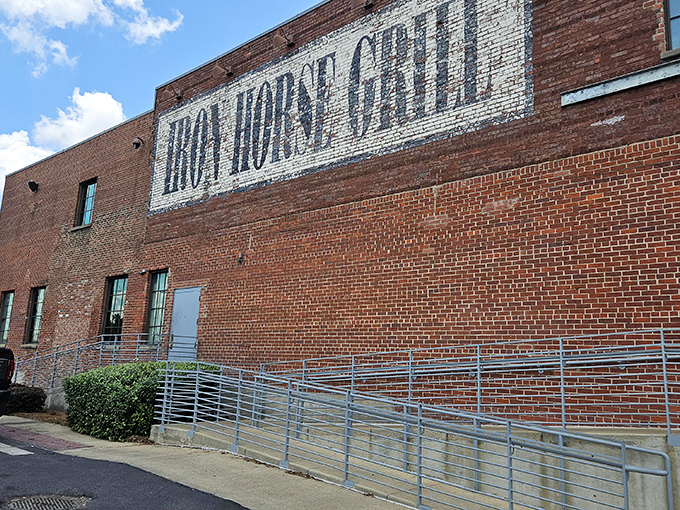 The Iron Horse Grill's illuminated sign transforms downtown Jackson's nightscape into a beacon for hungry adventurers seeking Southwestern salvation.