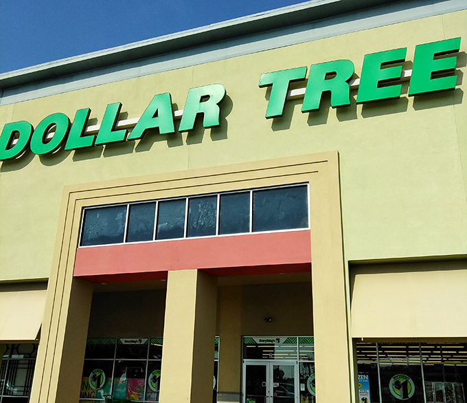The iconic green glow of Dollar Tree beckons bargain hunters like a retail lighthouse on Biloxi's Beach Boulevard.