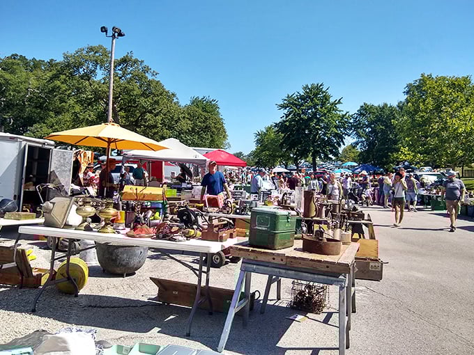 The weekend pilgrimage begins! Shoppers navigate this asphalt treasure map where one person's castoffs become another's must-haves. 