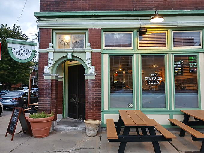 The mint-green trim and classic brick exterior of The Shaved Duck beckons like an old friend with a delicious secret to share.