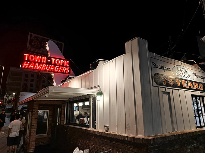 That neon glow isn't just a sign&mdash;it's a beacon of burger hope illuminating the Kansas City night, promising delicious salvation for hungry souls.