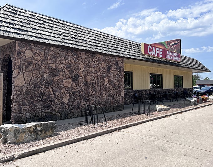 The stone exterior of Hi-Way Diner stands like a time capsule along Highway 2, promising comfort food that's outlasted countless food trends.