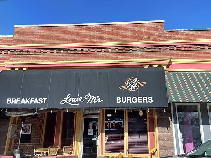 The unassuming storefront of Louie M's Burgerlust stands like a culinary lighthouse in South Omaha, promising breakfast and burgers with equal devotion.