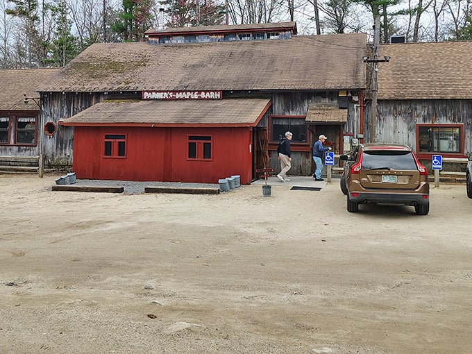The Corn Crib gift shop welcomes you with rustic charm and colorful flower decorations. Your maple syrup journey begins before you even reach the pancakes!