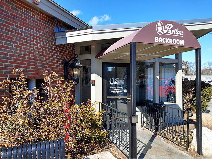 The unassuming entrance to the Puritan Backroom belies the culinary treasures within. Like finding a secret door to comfort food paradise.
