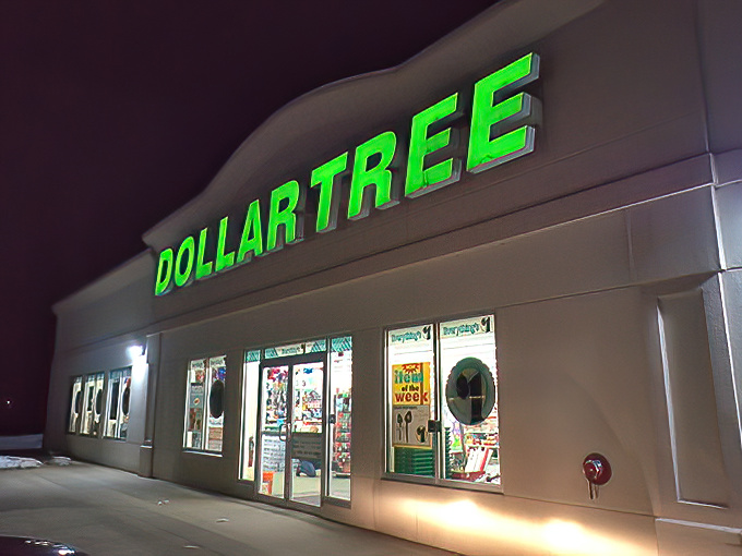 The iconic green glow of Dollar Tree's sign beckons bargain hunters like a budget-friendly lighthouse on the shores of Somersworth.