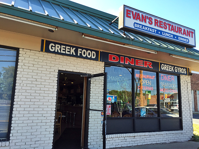 The unassuming brick exterior of Evan's Restaurant promises what every great Jersey diner should: honest food without pretension. No neon, just necessity.