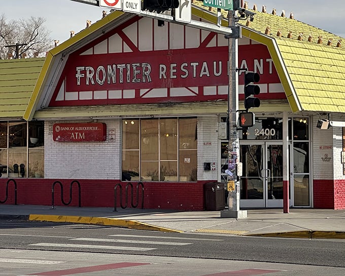 The iconic red and white facade of Frontier Restaurant glows like a beacon for hungry souls wandering Central Avenue after dark.