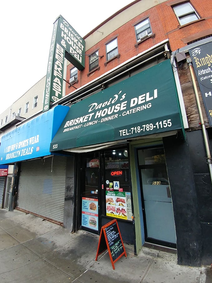 A beacon of brisket brilliance! David's Brisket House stands proud, its green awning a siren call to sandwich lovers everywhere.