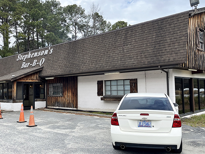 The unassuming exterior of Stephenson's Bar-B-Q stands like a barbecue time capsule, promising authentic flavors that no fancy facade could improve upon.