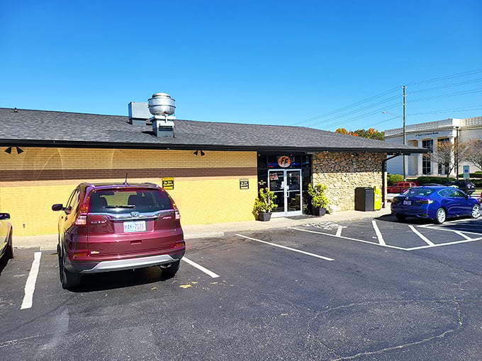 Stone and wood come together in this architectural handshake, where the American flag waves a patriotic hello to hungry visitors.