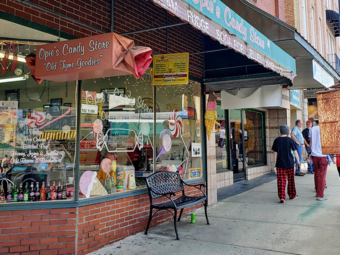 The storefront that launched a thousand sugar rushes! Opie's Candy Store beckons with its charming fa&ccedil;ade and promise of "Old Time Goodies" in downtown Mount Airy.