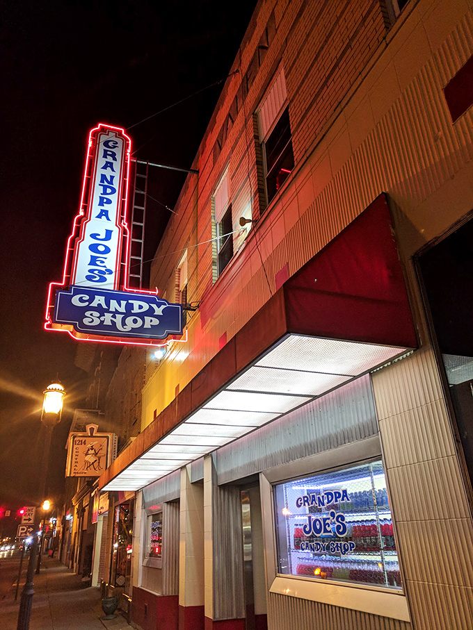 The candy-striped awnings of Grandpa Joe's beckon like a sweet siren call to downtown Middletown, promising sugary treasures within these historic brick walls.