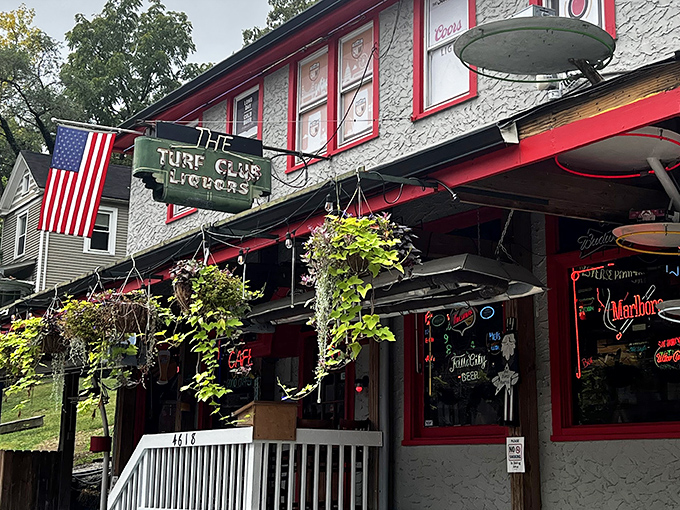 The Turf Club's exterior blooms with hanging flower baskets, a colorful welcome that says, "Yes, we care about beauty, but we care about burgers more."