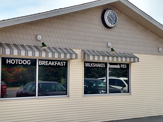 The unassuming exterior of Nutcracker Family Restaurant hides culinary treasures within. Those striped awnings practically whisper, "Come in, the pie is waiting."