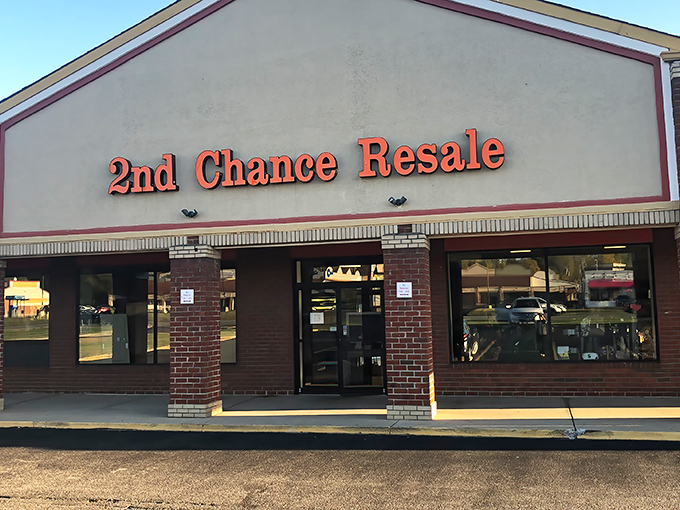 The iconic orange signage of 2nd Chance Resale beckons like a retail lighthouse, guiding bargain hunters to shores of unexpected treasures.