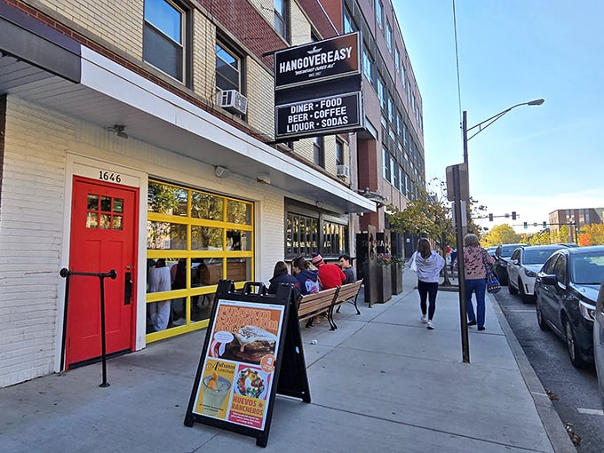 The iconic red door and yellow windows of HangOverEasy beckon like a breakfast lighthouse on Columbus's Neil Avenue, promising delicious salvation for hungry souls.