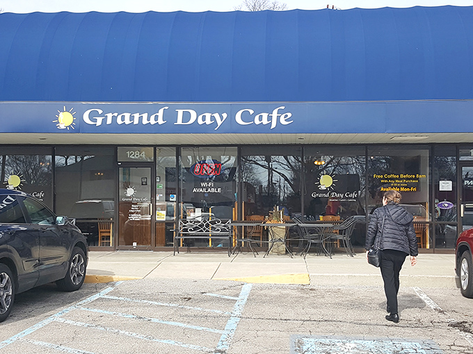 Like a beacon of breakfast hope, Grand Day Cafe's blue awning signals salvation for hungry Columbus locals seeking their morning hash brown fix.