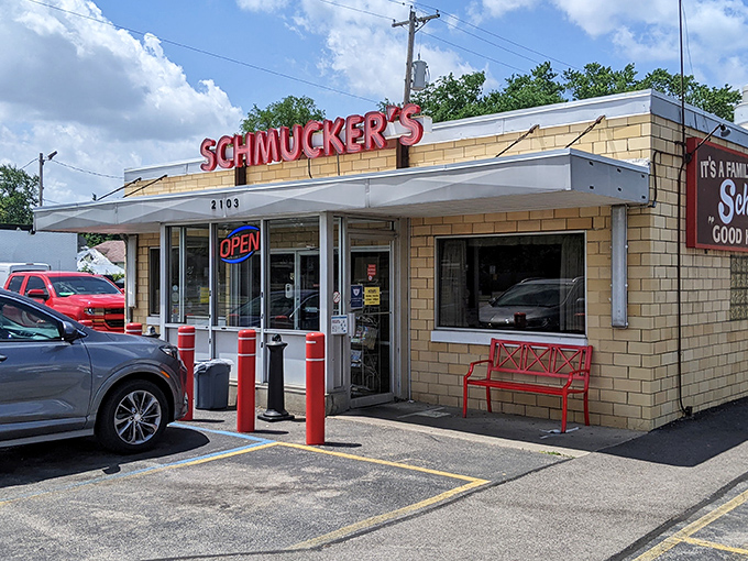 The iconic red sign beckons like a lighthouse for hungry souls. Schmucker's promises "Good Food" and delivers on that honest pledge daily.