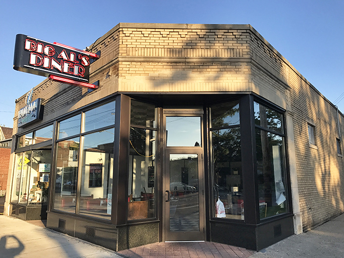 The unassuming brick exterior of Big Al's Diner stands like a time capsule on Larchmere Boulevard, promising honest food without the fanfare.