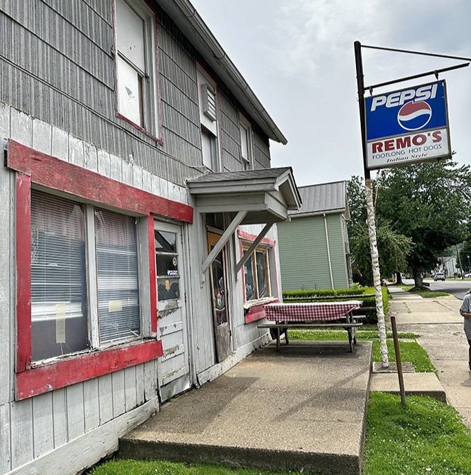 The unassuming exterior of Remo's Italian Hotdogs stands as a testament to the timeless truth: the most memorable meals often hide in the humblest buildings.