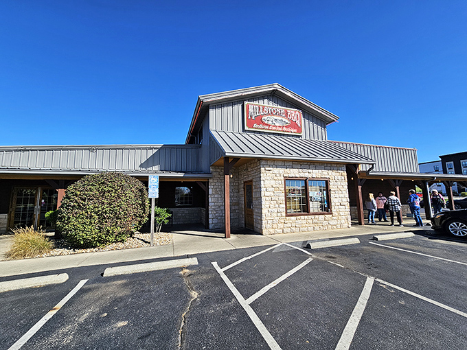 This unassuming stone-and-metal fa&ccedil;ade might look modest, but it's actually a barbecue cathedral where smoke-scented miracles happen daily.