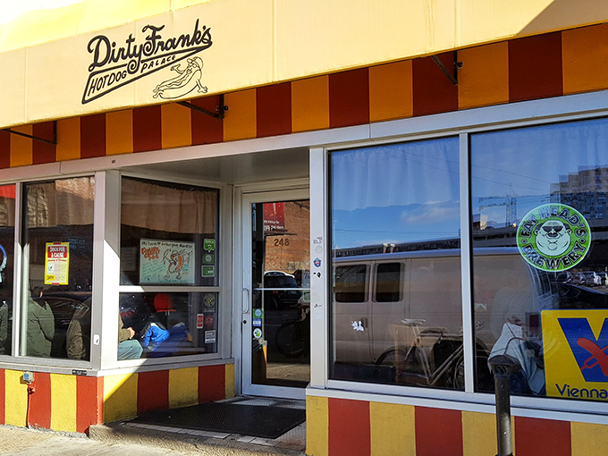 The sunshine-yellow awning of Dirty Frank's stands out against Columbus's urban landscape like a beacon for hungry hot dog pilgrims.
