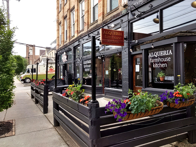 Curb appeal that stops traffic! Alqueria's flower-adorned exterior in Columbus promises the kind of farm-to-table experience that makes your stomach growl from the sidewalk.