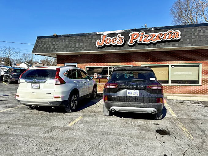 The brick facade of Joe's Pizzeria stands like a time capsule under Ohio skies, promising pizza perfection that's remained unchanged while the world around it spins madly on. 