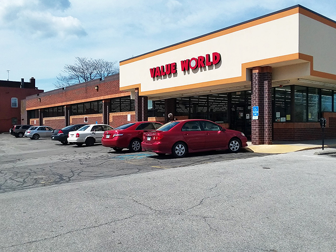 The iconic red Value World sign beckons like a lighthouse for bargain hunters. This unassuming storefront houses treasures waiting to be discovered.