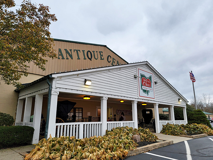 The white-columned porch of Heart of Ohio Antique Center beckons like a Southern mansion that swallowed a warehouse. Treasure hunting begins at the threshold.