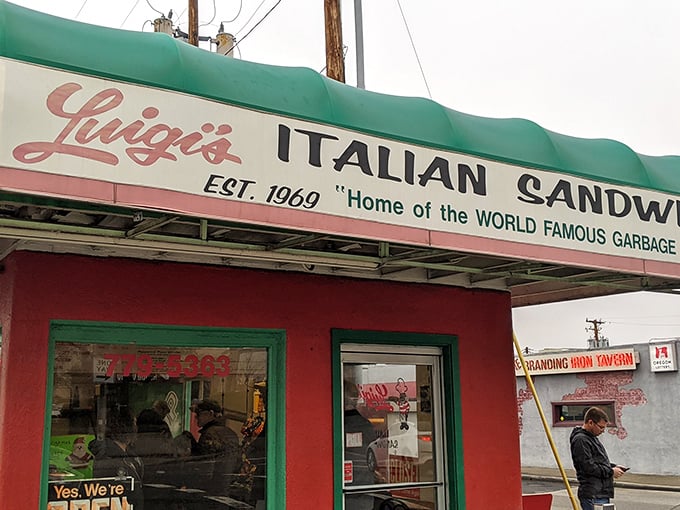 The iconic red and green exterior of Luigi's screams "authentic Italian joint" with all the subtlety of an enthusiastic nonna inviting you to mangia!
