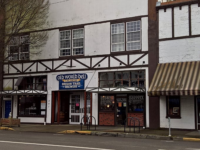 The Tudor-style facade of Old World Deli stands as a European oasis in downtown Corvallis, promising culinary adventures behind those wooden beams and white stucco walls.