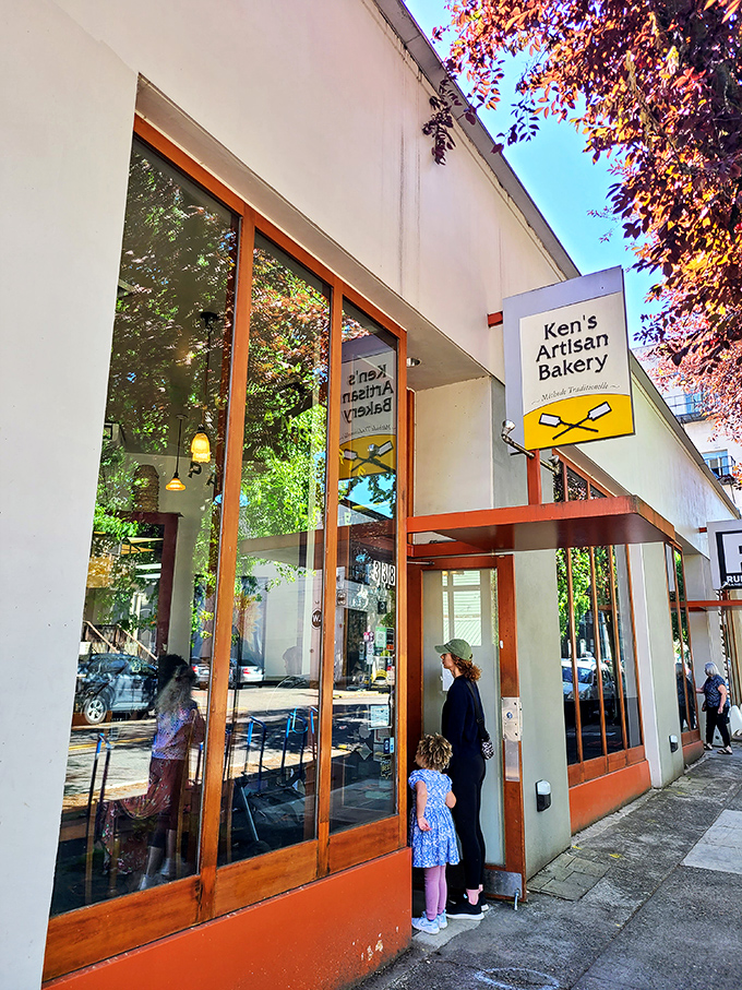 The unassuming storefront on NW 21st Avenue hides Portland's bread paradise, where that iconic yellow sign with crossed rolling pins beckons carb enthusiasts from across Oregon.