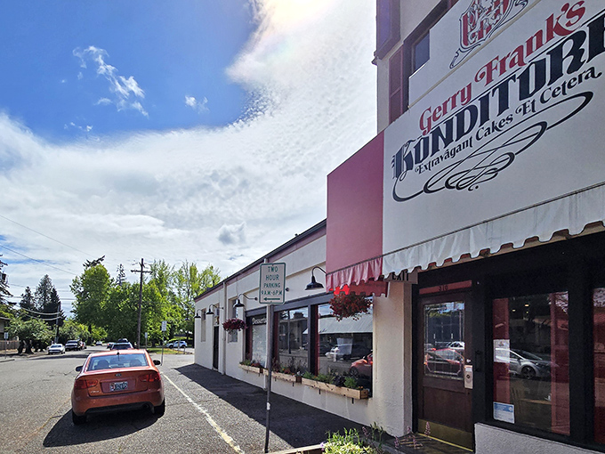 The charming red and white exterior of Gerry Frank's Konditorei stands like a European postcard in the heart of Salem, complete with a chef statue standing guard.