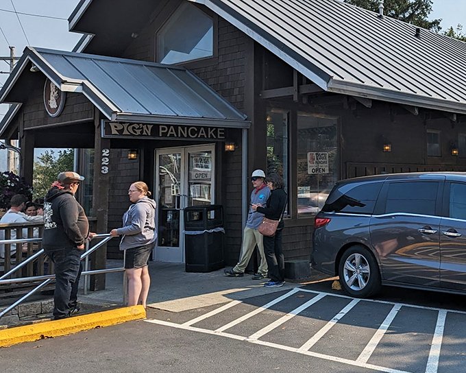 The quintessential Oregon coast welcome! Pig 'N Pancake's rustic timber exterior promises comfort food salvation after a brisk morning beach walk.