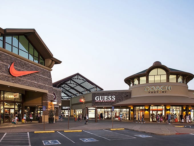 The retail trifecta of Nike, Guess, and Coach beckons shoppers like a siren song. Your wallet is already getting nervous.