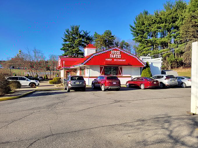The iconic red barn exterior of Dutch Pantry stands like a beacon of comfort food amid Pennsylvania's greenery. Americana at its most delicious.