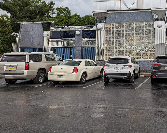 The gleaming silver exterior of Springfield Diner stands like a time capsule of Americana, beckoning hungry travelers with its retro-modern charm.