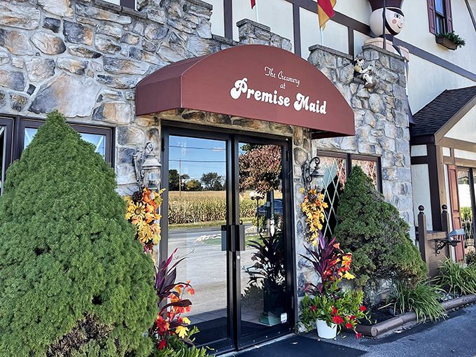 The charming Tudor-style facade of Premise Maid beckons like a fairytale cottage where calories don't count and chocolate dreams come true.