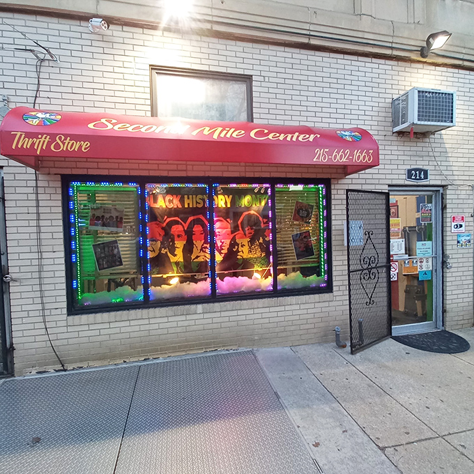 The bright red awning of Second Mile Center beckons like a lighthouse for bargain hunters, promising treasures within its unassuming brick exterior.
