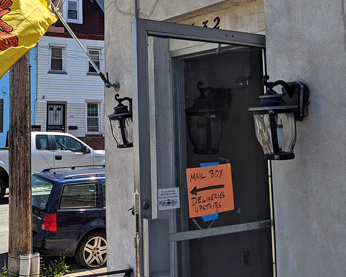The unassuming entrance to culinary paradise. No neon signs or valet parking here&mdash;just an honest doorway to breakfast bliss in Fishtown.