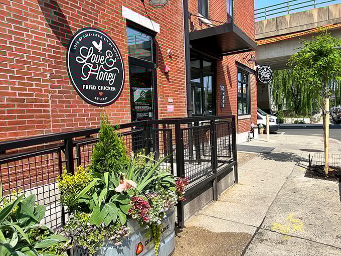 The unassuming brick fa&ccedil;ade of Love & Honey belies the culinary magic happening inside. Philadelphia's best-kept fried chicken secret hides in plain sight. 