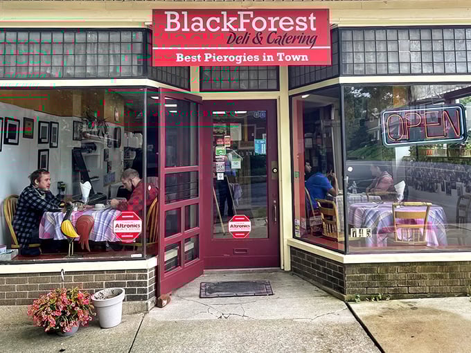 A humble brick exterior with a bright red sign that belies the culinary treasures within. This unassuming storefront in Bethlehem is where food dreams come true.