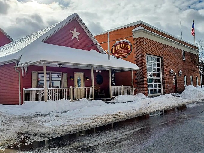 Winter transforms Harland's into a postcard-perfect scene, where that iconic white star promises warmth and comfort food just beyond the red siding.