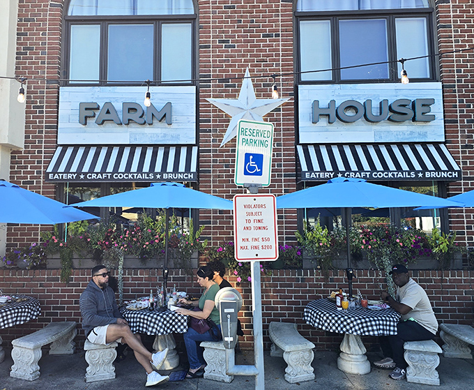 The iconic silver star between "FARM" and "HOUSE" isn't just decoration&mdash;it's a beacon calling hungry travelers to this brick-fronted culinary haven.