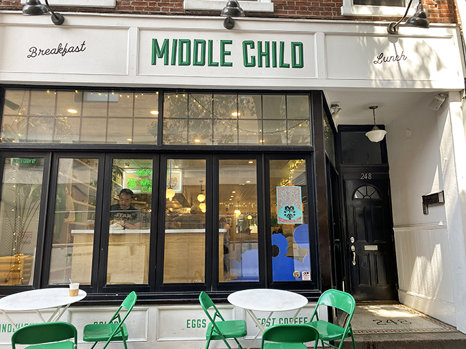 Middle Child's charming storefront invites you in with its clean white facade and green accents. The sidewalk seating practically begs you to linger over breakfast.