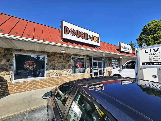 The stone and brick facade of Dough n Joe stands like a humble temple to fried dough, its red roof and simple sign beckoning carb enthusiasts from miles around.