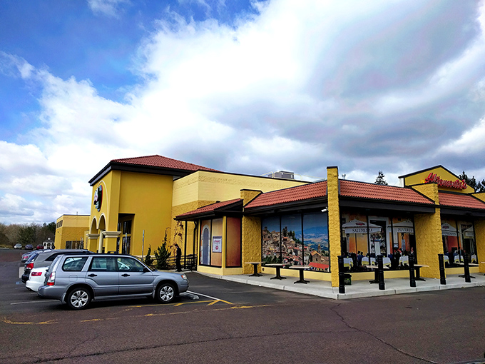 The golden arches of Italy beckon from suburban Pennsylvania—Altomonte's sunny façade promises Mediterranean treasures within those welcoming doors.